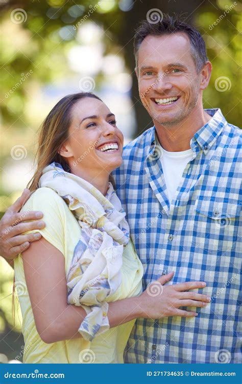 Their Love Is Real Portrait Of An Affectionate Couple Outside In The