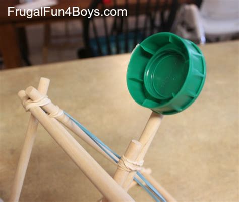how to build a catapult out of dowel rods and rubber bands frugal fun