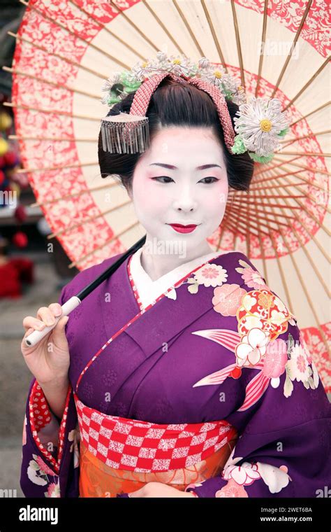 Beautiful Japanese Geisha Maiko In Kyoto Japan With Umbrella Stock