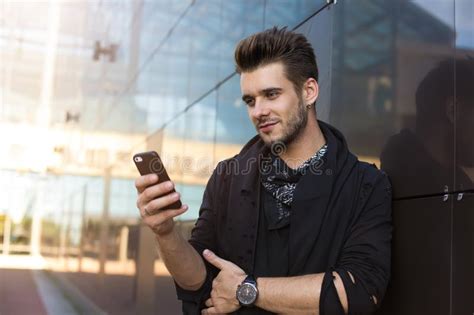 Bearded Fashionable Hipster Guy Chatting In Social Network Via Mobile