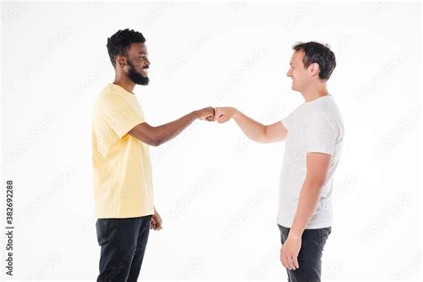Fist Bump Greeting Two People Greet Each Other In A Meeting Give Up