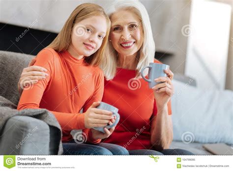 Nice Aged Woman Hugging Her Granddaughter Stock Image Image Of