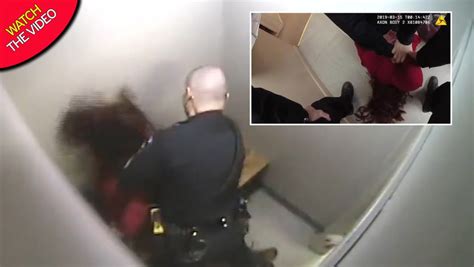 Policeman Fired For Punching Handcuffed Woman After She Kicked Cell