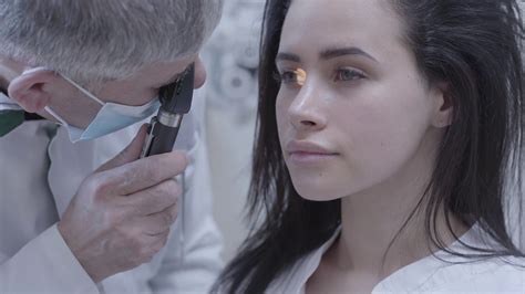 portrait of pretty brunette smiling woman sitting in the chair of