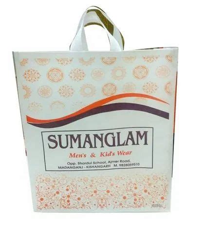 White Base Printed Non Woven Loop Handle Bag Capacity 7kg Size