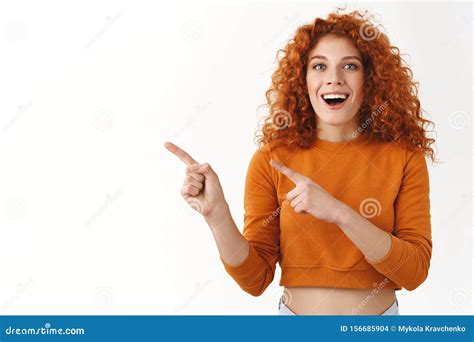 Dreamy Attractive Cheerful Redhead Woman With Blue Eyes Curly Hair
