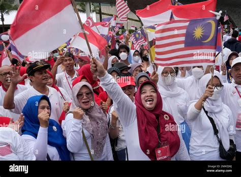 People Gather Waving Asean Member Country Flag During The Kick Off 2023