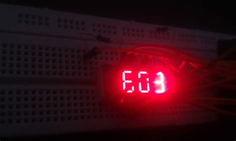 how to interface a 4 digit 7 segment display with arduino uno