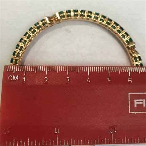 9 Carat Oval Emeralds And Diamonds 18 Karat Gold 23 Grams Bangle