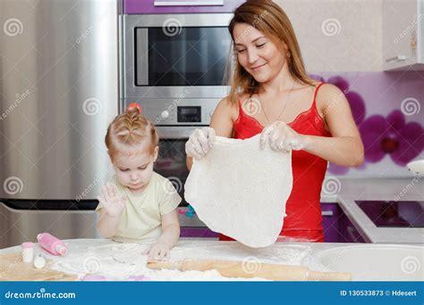 Mother And Daughter Making Dough At Home Kitchen Stock Image Image Of