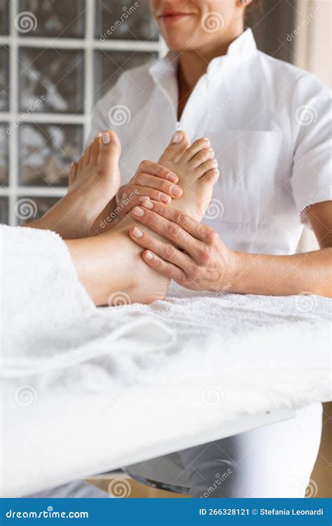 Crop Masseur Massaging Foot Of Client In Spa Salon Stock Image Image