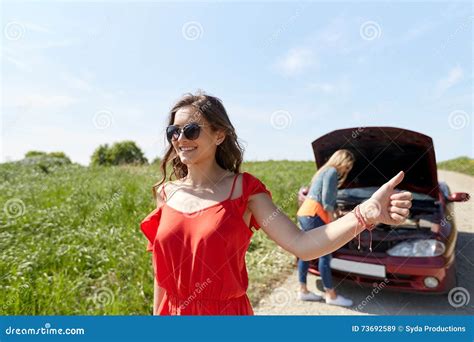Women With Broken Car Hitchhiking At Countryside Stock Image Image Of