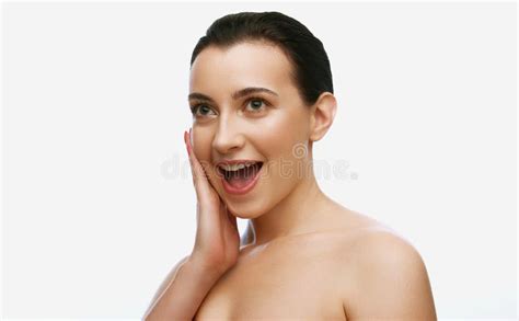 Portrait Of Beautiful Brunette Woman With Bare Shoulders And Perfect