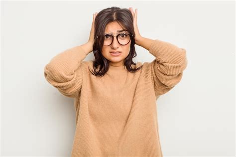 Premium Photo Covering Ears With Hands Trying Not To Hear Too Loud Sound