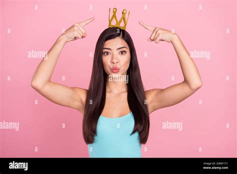 Photo Of Flirty Millennial Long Hairdo Lady Point Crown Blow Kiss Wear