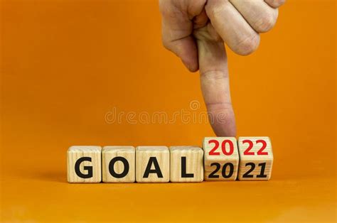 Planning 2022 Goal New Year Symbol Businessman Turns A Wooden Cube And