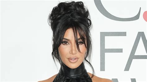 Kim Kardashian Shows Off Stunning Curves In Tight Backless Dress In New