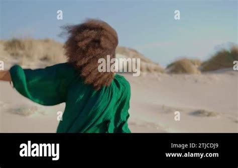 Contemporary Dancer Performing At Sand Desert Windy Summer Day Close Up
