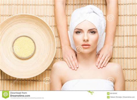 Beautiful Young And Healthy Woman On Bamboo Mat In Spa Salon Ha Stock