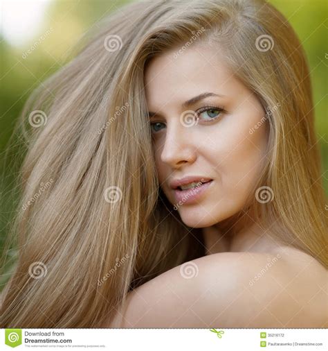 Portrait Of Beautiful Young Blond Woman With Clean Face Outdoor Stock