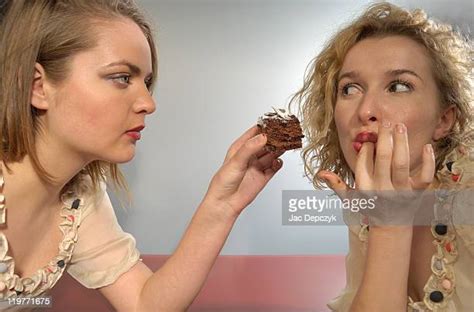 Friends Sharing Chocolate Photos And Premium High Res Pictures Getty