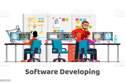 programmers writing code in a software developing company office