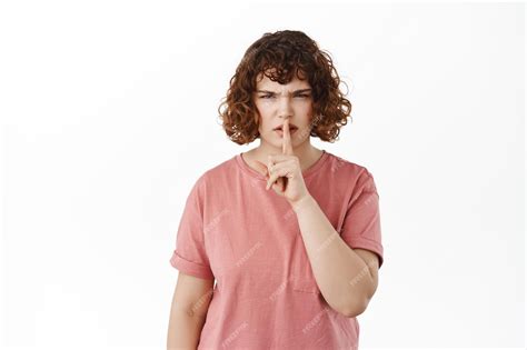 Premium Photo Portrait Of Angry Caucasian Girl Tell To Be Quiet