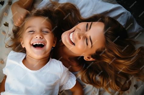 Premium Ai Image Top View Of A Mother And Her Daughter Laughing