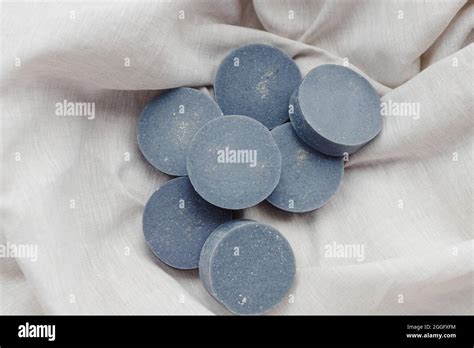 Handmade Solid Shampoo And Conditioner Bars On Paper Background Copy