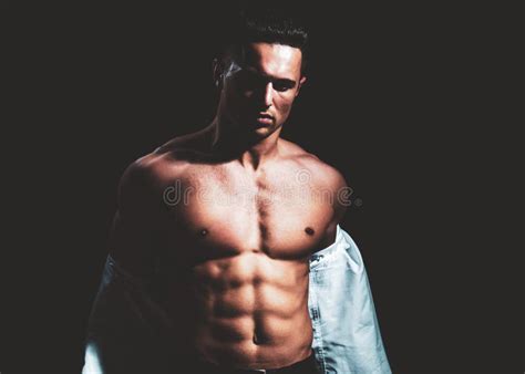 Young Gay Man Model Athlete With Muscular Body And Wet Bare Chest