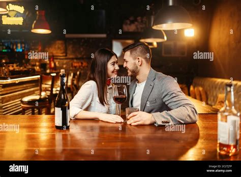 Romantic Evening In Bar Love Couple Kissing At Wooden Counter Lovers