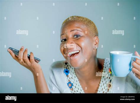 Isolated Young Attractive And Happy Black Afro American Woman Holding