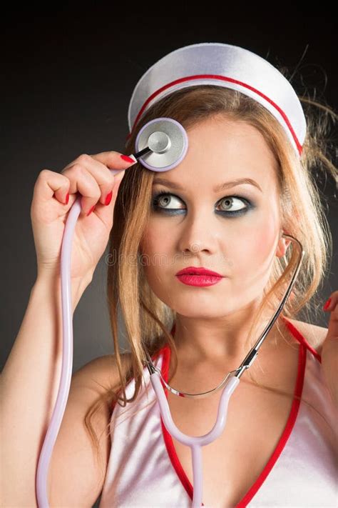 Female Nurse Pointing Out Eye Chart To Man Stock Image Image Of