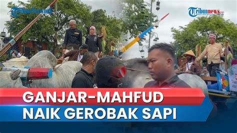 Penampakan Ganjar Mahfud Naik Gerobak Sapi Saat Kirab Kampanye Akbar Di