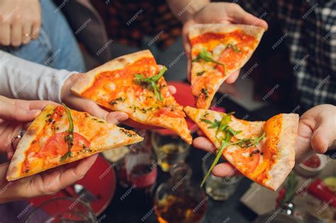 Premium Photo Eating Food Closeup Of People Hands Taking Slices Of