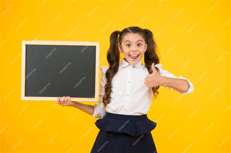 Premium Photo Good News Schoolgirl Pupil Long Hair Informing You