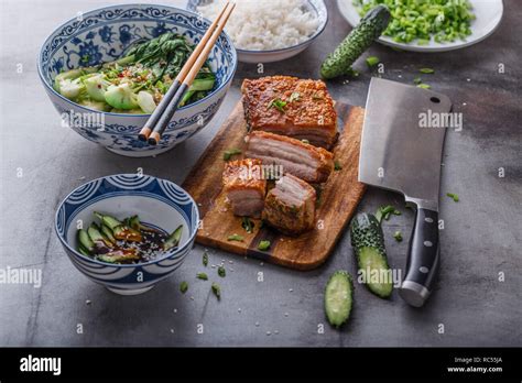 Asian Roasted Pork Belly With Crispy Skin On Concrete Background Stock