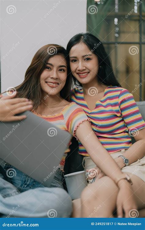 Happy Lesbian Lgbtq Couple In Love Cuddling Laughing Having Fun At