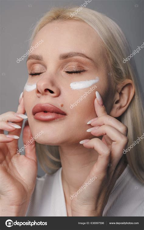 Beautiful Young Woman Natural Makeup Applying Cream Her Fresh Face