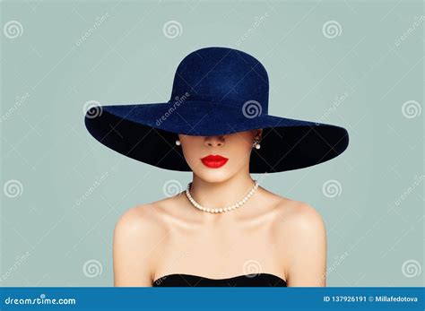 Elegant Woman In The Red Bikini On The Sun Tanned Slim And Shapely Body