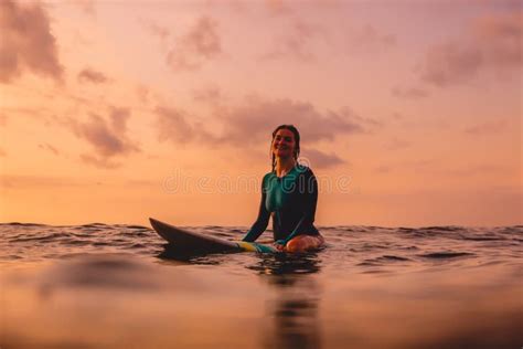Surfer Woman Sit On A Surfboard In Ocean Stock Image Image Of Perfect