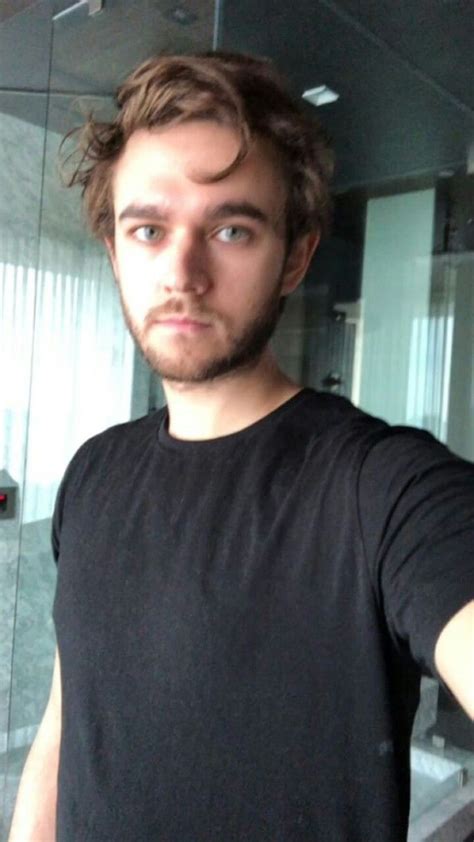 Man Taking Selfie In Front Of Mirror