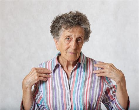 Premium Photo Old Woman Between 70 And 80 Years Old Shows That She