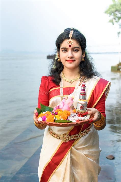 Portrait Of Beautiful Indian Girl In Front Of Ganga River Wearing