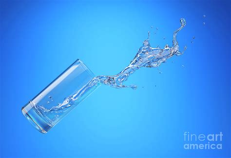 Glass With Spilling Water Splash Photograph By Leonello Calvetti