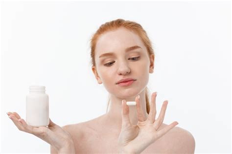 Premium Photo Beautiful Smiling Girl Taking Medication Holding