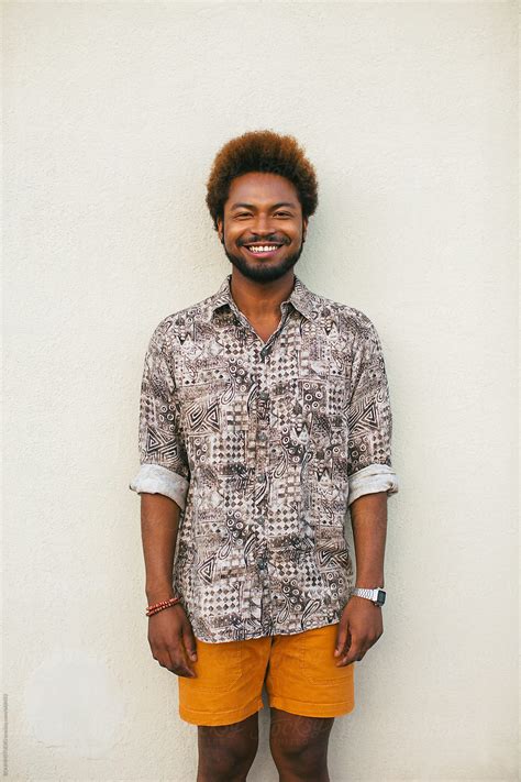 «portrait Of An African American Man Standing Outside Looking At Camera
