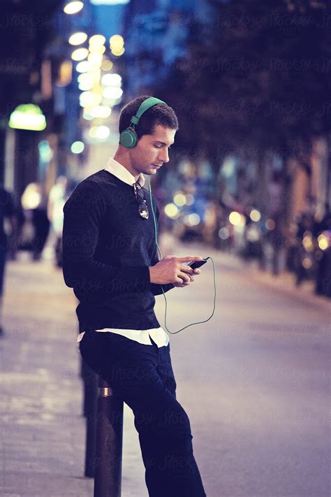 «modern Casual Man On The Street He Is Listening Music On Phone With