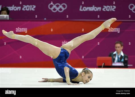 Russian Gymnast Victoria Komova Goes Through Her Routine On The Floor
