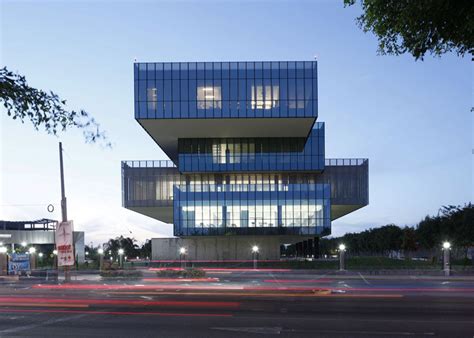 glazed boxes cantilever outwards from tatiana bilbao s bioinnova